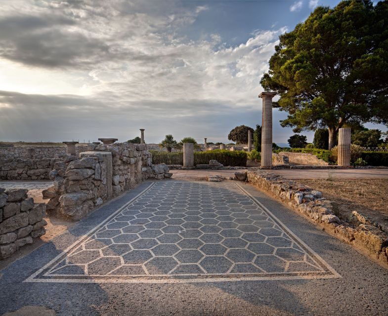 Costa Brava: Private Tour of Empuries and Boat Ride - Exploring a Traditional Fishing Village
