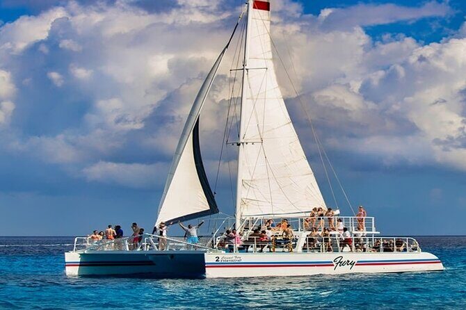 Cozumel Catamaran Experience with Snorkeling & Beach Club - Key Points