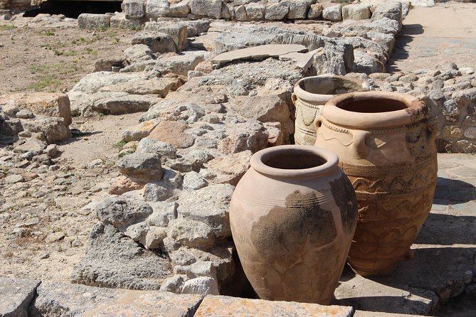 Crete Minoan Discovery Tour with Knossos Palace, Heraklion, and Live Dance Show - Exploring Knossos Palace: A Step Back in Time