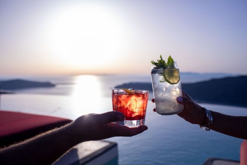 Daybed Relaxation with infinity pool use with caldera views - A Luxurious Escape with Caldera Views: Our Review of the Daybed Relaxation Experience in Greece