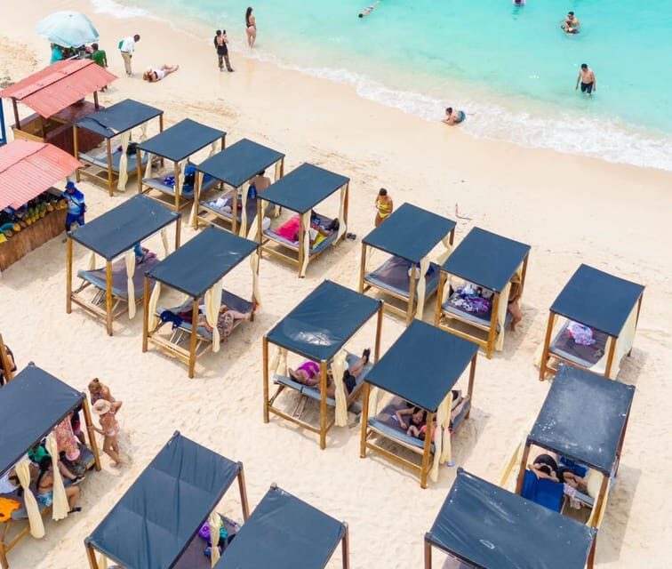 Daytour to Playa Tranquila VIP with Parasols, Lunch by bus! - Key Points