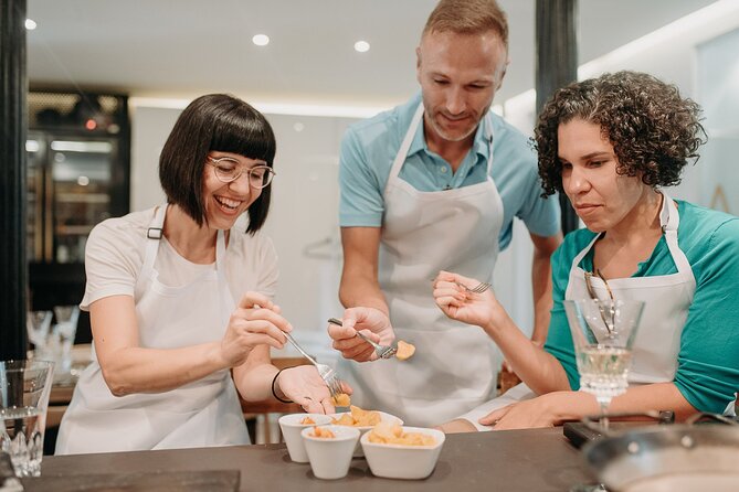 Devour Madrid: Paella & Tapas Cooking Class & Local Market Visit - Key Points