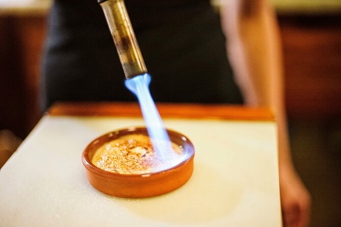 Devour Madrid: Paella & Tapas Cooking Class & Local Market Visit - Hands-On Cooking Experience