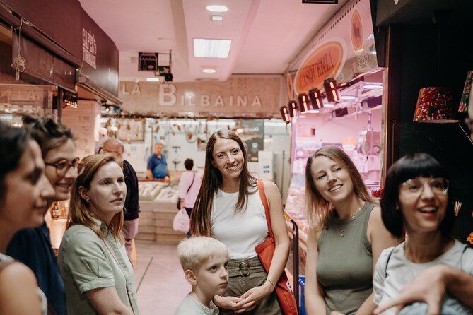 Devour Madrid: Paella & Tapas Cooking Class & Local Market Visit - Exploring Delicious Tapas