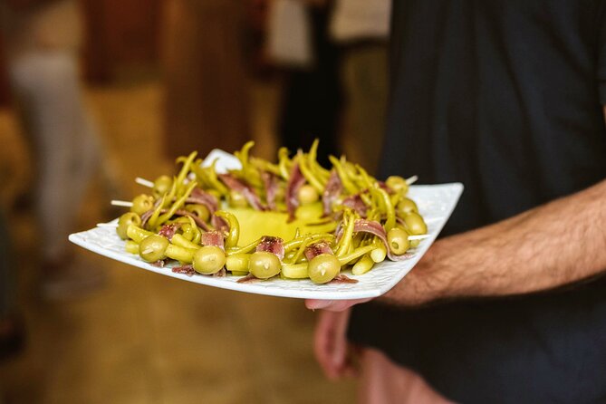 Devour Madrid: Paella & Tapas Cooking Class & Local Market Visit - Guest Reviews and Experiences