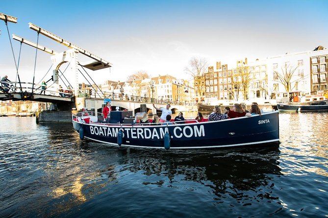 Discover Amsterdams Canals: Relaxing Open Boat Cruise Adventure! - Relaxing Open-Air Boat Experience