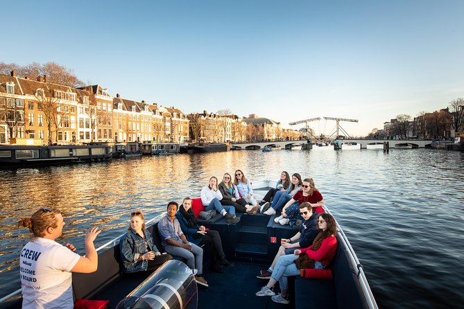 Discover Amsterdams Canals: Relaxing Open Boat Cruise Adventure! - Sip on Included Drinks as You Cruise