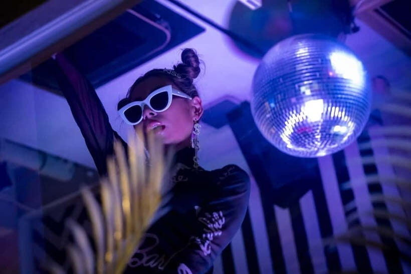 Discover Osaka's VIP Nightlife: Shisha & All You Can Drink - The Atmosphere: Music, Dancers, and a Lively Crowd