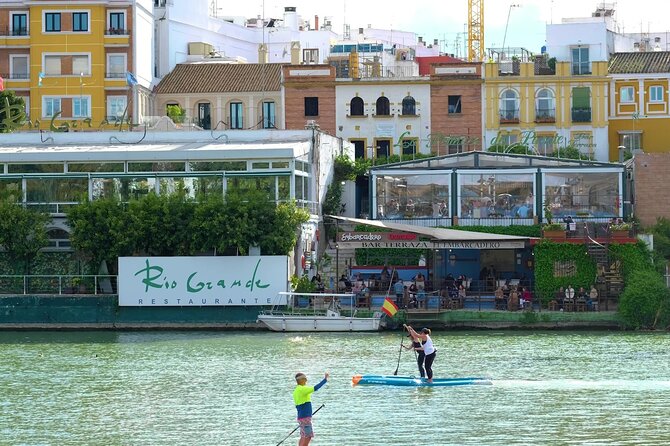 Discover the River and the Secrets of Triana Quarter in Seville - The Authentic Ambiance of Triana
