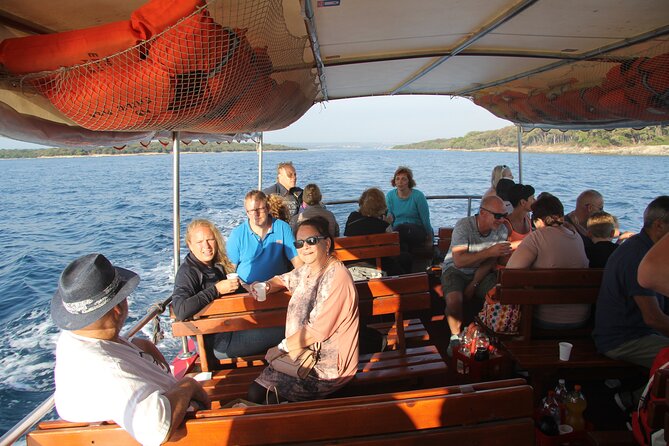Dolphin Watching Sunset Boat Trip in Pula With Dinner - Dining Experience
