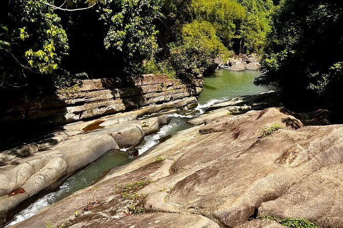 El Yunque Rainforest Waterslides and Luquillo Beach Tour - Key Points