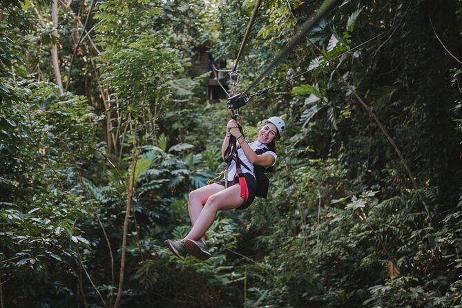 El Yunque Ziplining with River and Beach Visit - Key Points