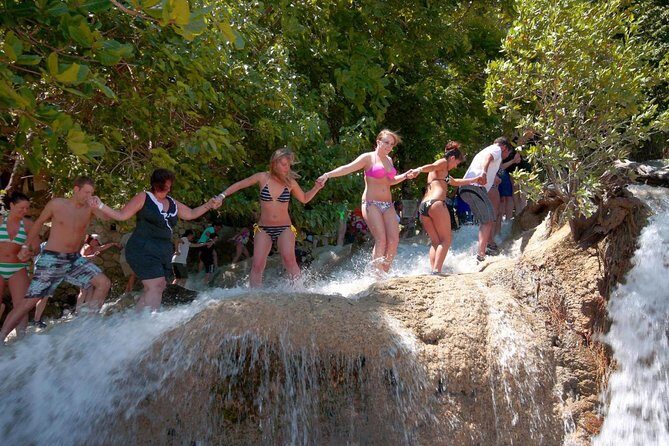 Exhilarating Dunn's River Falls Guided Tour from Ocho Rios hotels - Key Points