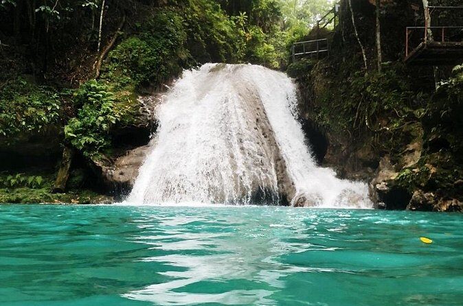 "Explore Scenic Tropical Waterfalls at Blue Hole" - Authenticity and Comfort