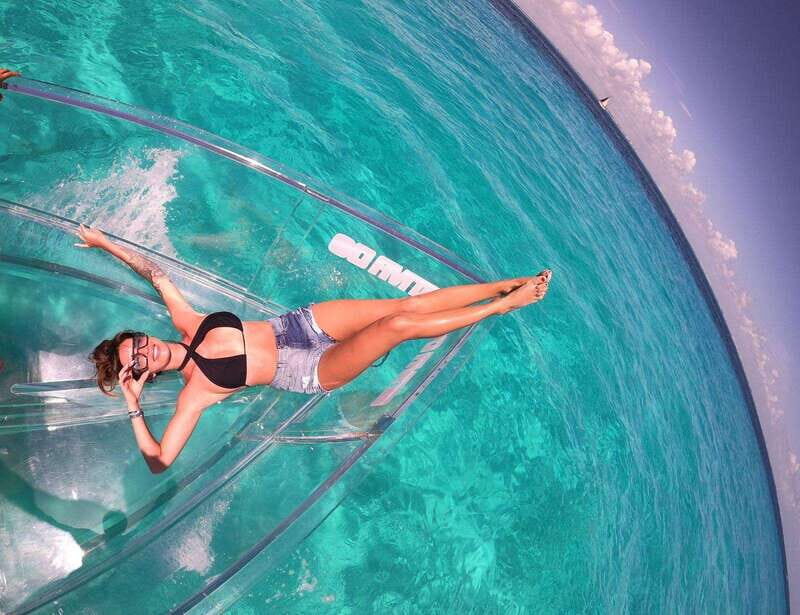 Explore the sea of cozumel in a transprent boat with drinks and snorkel. - Starting Point and Overall Experience
