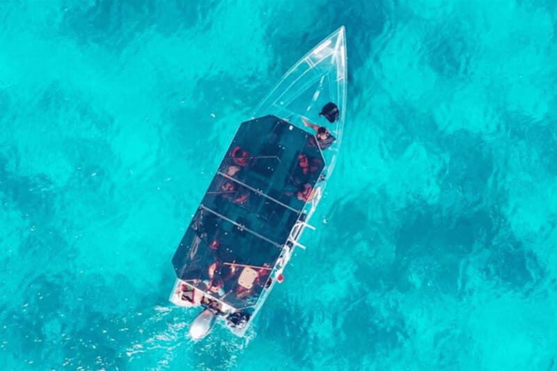 Explore the sea of cozumel in a transprent boat with drinks and snorkel. - Additional Details: What You Need to Know