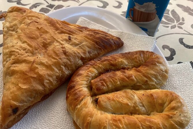 Exploring Tirana A Blend of Stories and Street Flavors - Historic Charm: Tanners’ Bridge and the Parliament