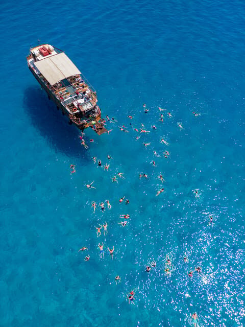 Faliraki : Transfer & Cruise to Lindos with 3 Swimming Stops - A Complete Breakdown of the Experience
