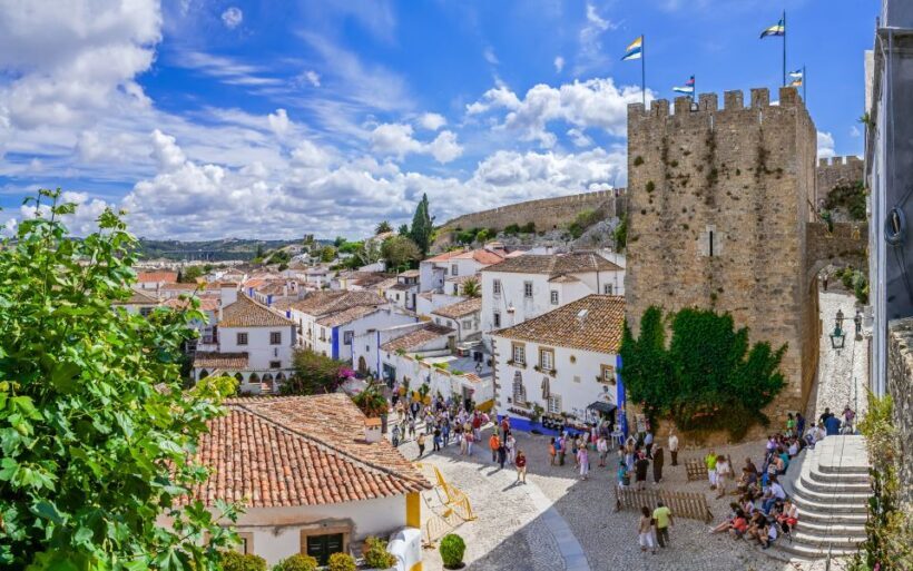 Fátima, Nazaré, and Óbidos: Small Group Tour From Lisbon - Return Journey and Reflection