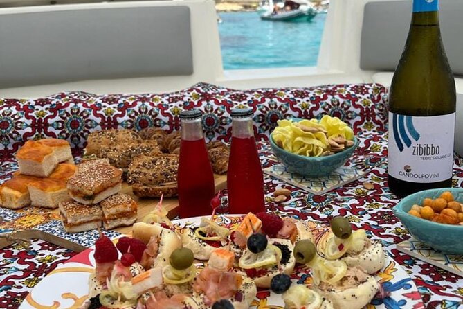 Favignana Inflatable Boat Tour, Wine Tasting, Snorkeling and Relaxation - Guide Identification and Participation Requirements