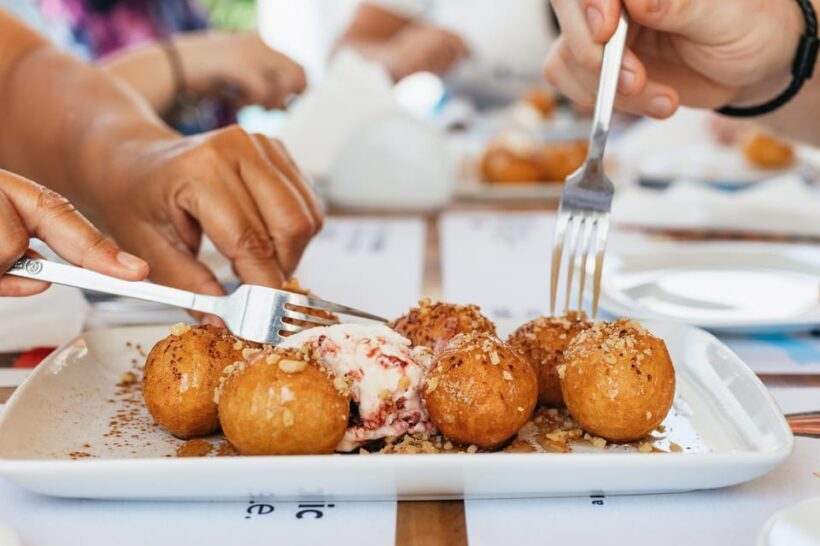Fira: Guided Foodie Walking Tour with Tastings - Tasting Greek Mezes in a Traditional Tavern