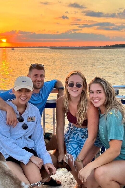 Folly Beach: Sunset Dolphin Boat Tour to Morris Island - The Sum Up