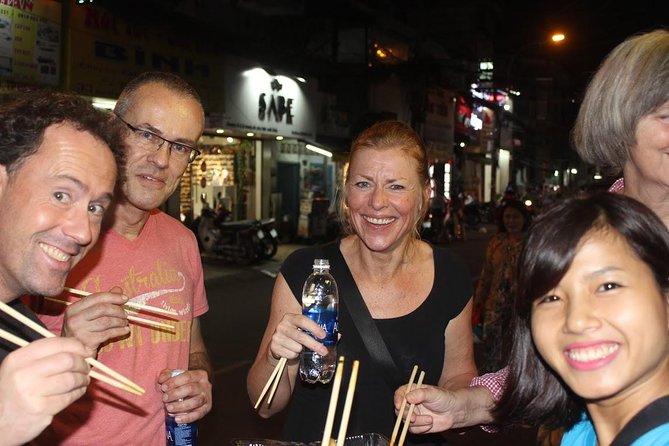 Food Tour by motorbike with local students - A Taste of Ho Chi Minh City’s Streets on a Motorbike Food Tour