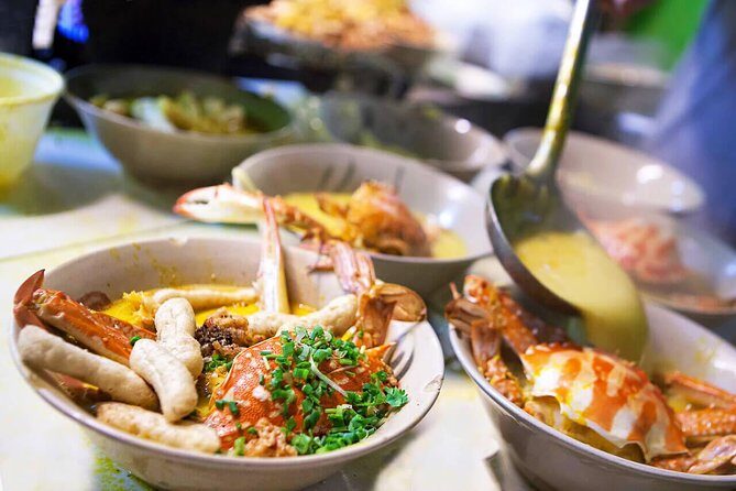 Food tour by Vespa - SAIGON AFTER DARK - A Fun and Flavorful Introduction to Saigon