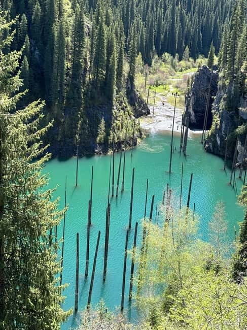 From Almaty: Kolsay, Kaindy, Charyn & Black Canyon Day Tour - Kayindy Lake: Nature’s Hidden Treasure