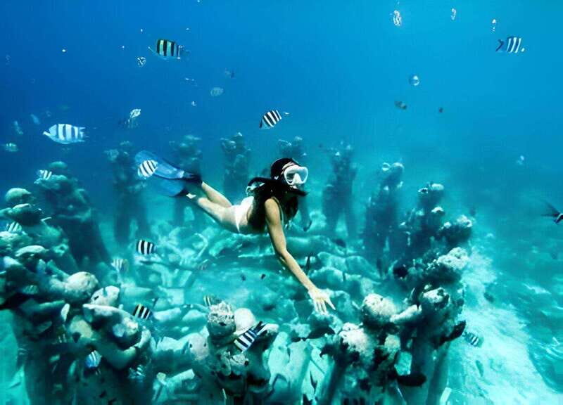 From Cancun: Isla Mujeres by Luxury Catamaran with Drinks - Who Should Consider This Tour?