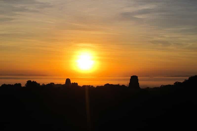 From Flores: Tikal Ruins Sunrise Guided Tour - Key Points