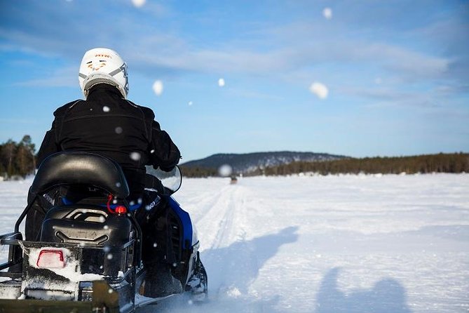 From Ivalo: Ice Fishing Safari to Lake Inari, Reindeers & Lunch - Snowmobile-Drawn Sleigh Ride to Lake Inari