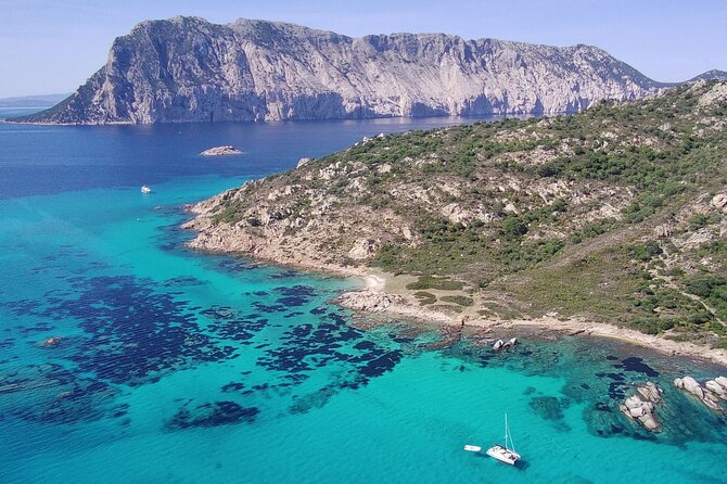 From Olbia: catamaran tour between Tavolara and Cala Moresca - Weather and Flexibility