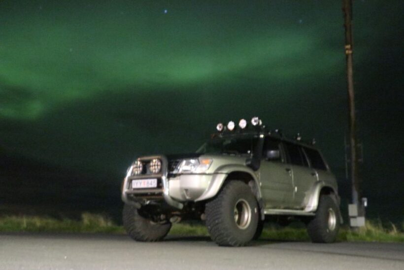 From Reykjavík: Spot the Northern Lights with Snacks & Drink - Key Points