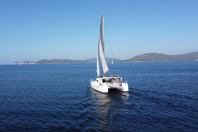 Full Day Catamaran Tour in Alghero - Inclusions and Pricing