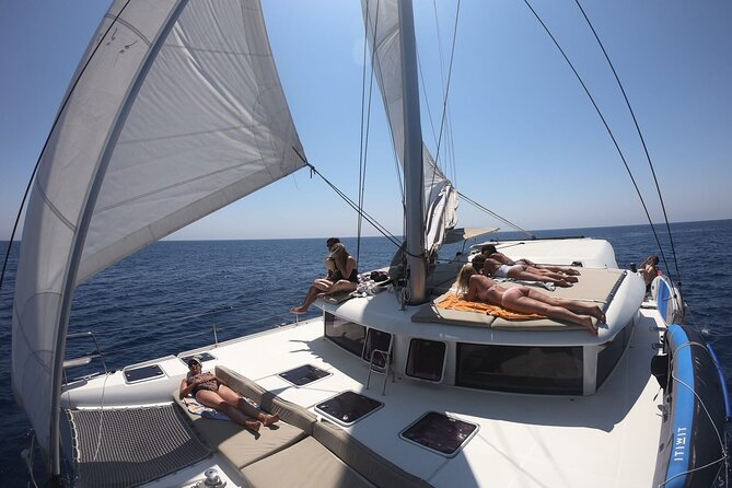Full Day Catamaran Tour in Alghero - Positive Feedback From Travelers