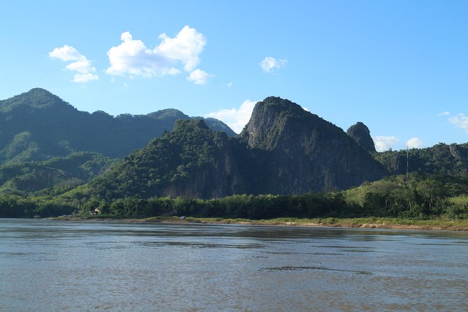 FULL DAY  Kuang Si Waterfall, Kayak on the Nam Ou / Mekong River, Pak Ou Caves - The Sum Up