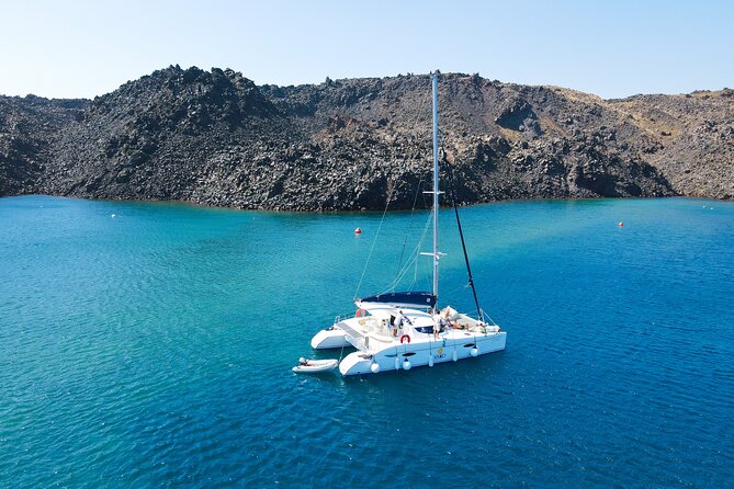 Full Day Santorini Catamaran Private Cruise With Meal and Transfer - Transportation and Meeting Details
