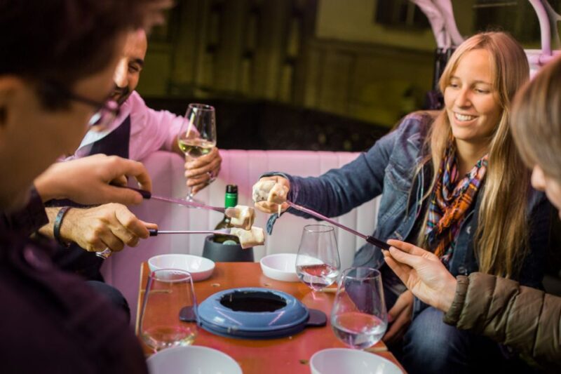 Geneva: Tour With Fondue and Wine in Tuktuk - Experience Highlights