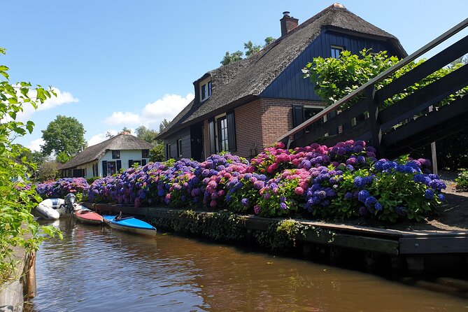 Giethoorn Day Tour from Amsterdam with Small Boat Ride - Transportation and Timing