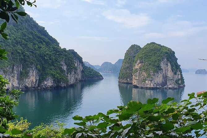 Ha Long Bay Cruise Day Tour - Cave, Kayaking, Swimming & Lunch - Titop Island: Beach, Trekking, and Panoramic Views