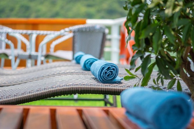 Ha Long Bay Cruise Day Tour with lunch, kayaking, surprise cave & titop island - Review Highlights and Authentic Perspectives