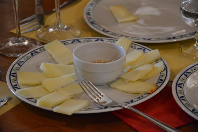 Half-Day Chianti Tour to 2 Wineries With Wine Tastings and Meal - Itinerary and Experiences