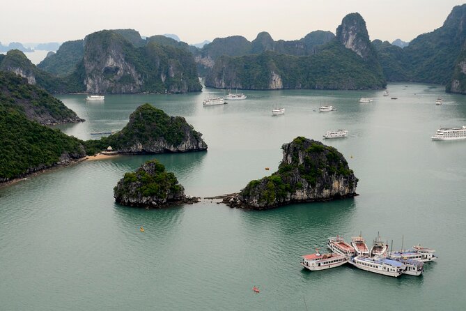Halong Bay day cruise with Cave, Kayaking and Swimming on highway - The Sum Up