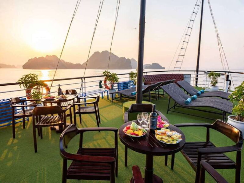 Halong Bay: Day Cruise with Caves, Kayaking & Sunset Party - Scenic Boat Ride and Iconic Limestone Formations