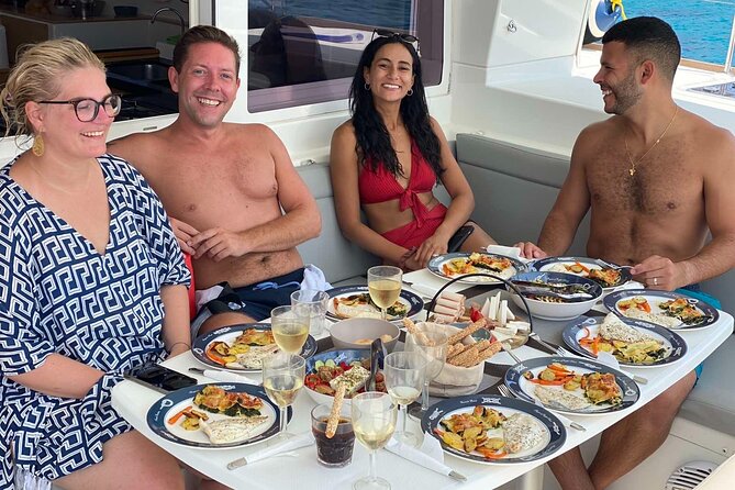 Heraklion: Dia Catamaran Tour, Lunch, Open Bar & Snorkeling - Guest Experiences and Highlights