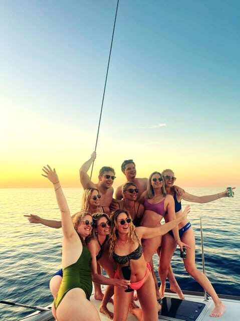 Hersonissos: Sunset Catamaran Cruise with Snacks and Drinks - The Water and Food Experience