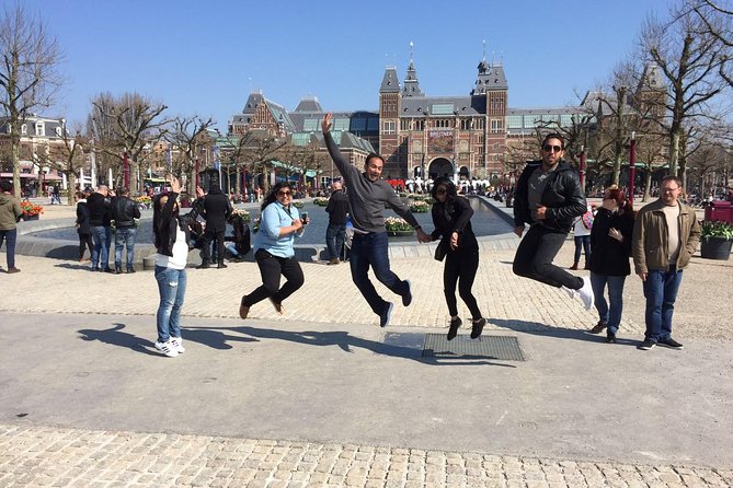 Historical Bike Tour Review: Explore Amsterdam's Charm - Discovering Iconic Landmarks