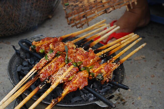 Hoi An Local Food by Motorbike and Teh Dar Bamboo Circus Show - Who Should Consider This Tour?