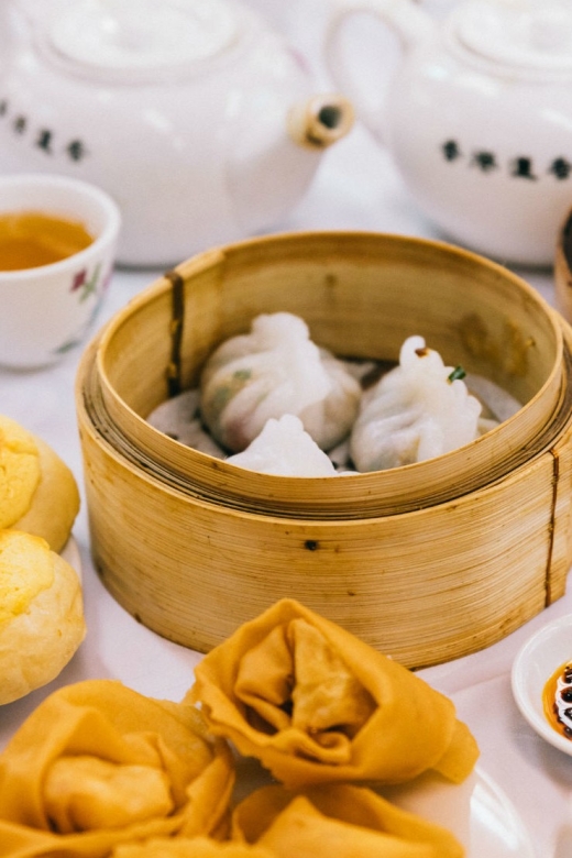 Hong Kong: Private Food Tour with 10 Tastings - The Guide’s Role and Experience Value